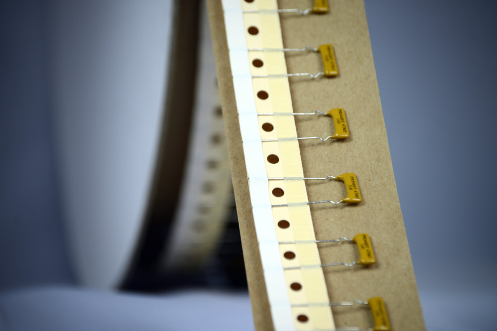 Radial Taping - America Tape and Reel